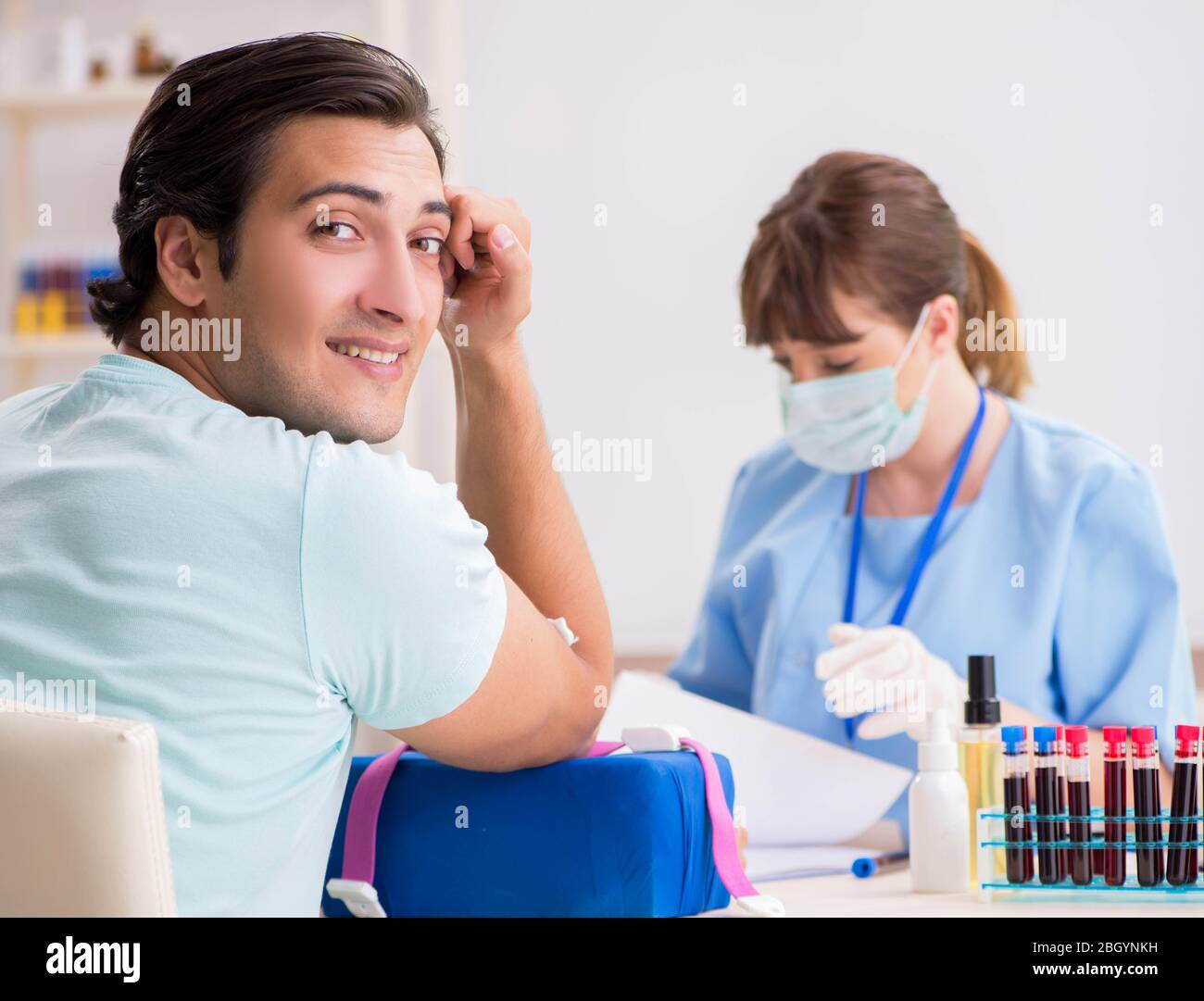 The young patient during blood test sampling procedure Stock Photo - Alamy