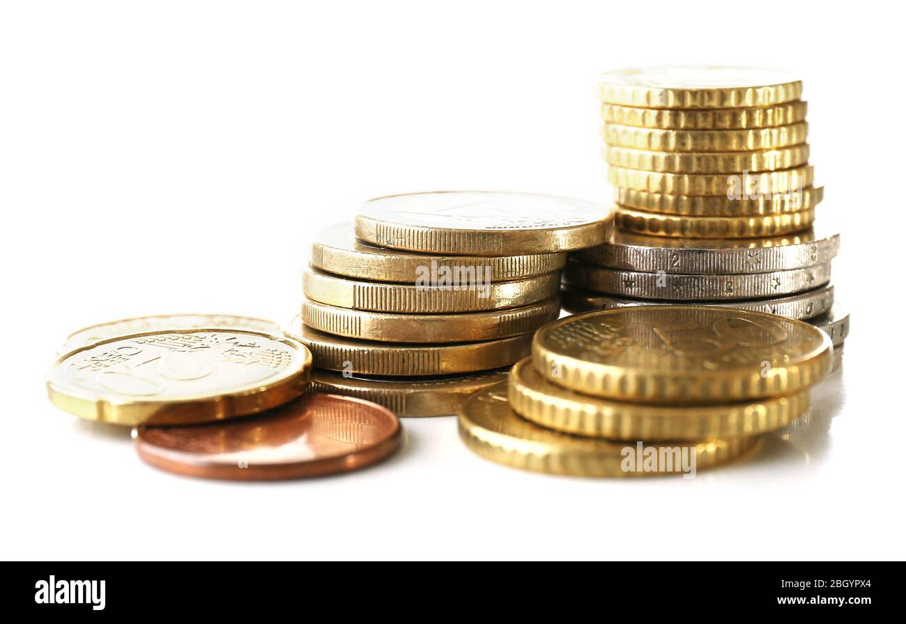 Pile of coins isolated on white Stock Photo - Alamy