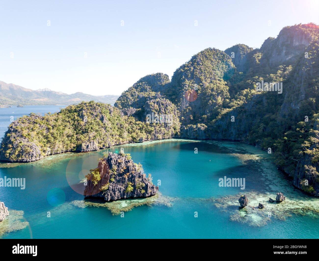 Aerial of magnificent Coron island lagoon, turquoise clear water and ...