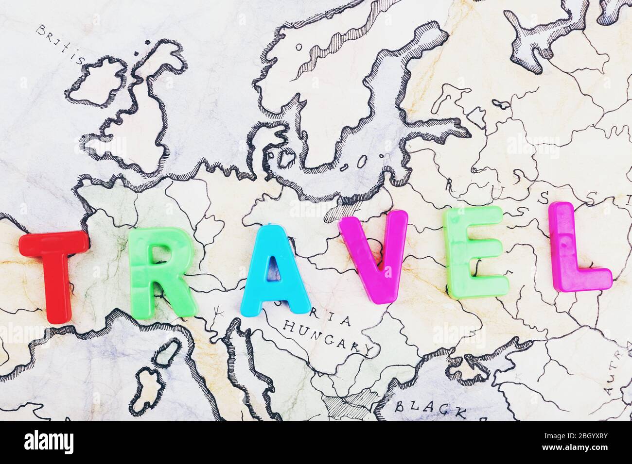 Colorful word Travel on World map background Stock Photo - Alamy