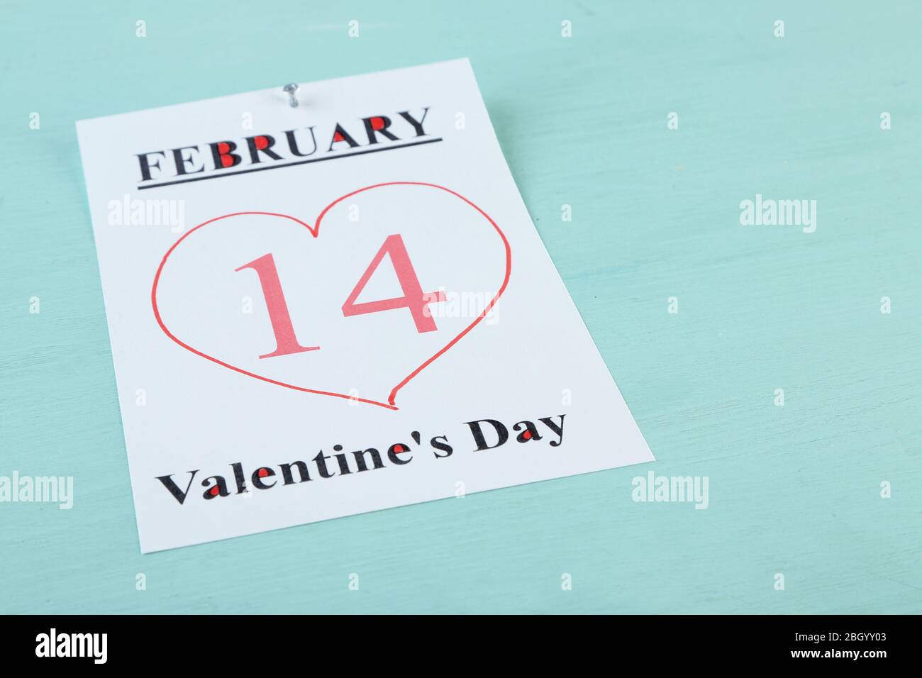 Valentines Day, February 14 on calendar on wooden background Stock ...