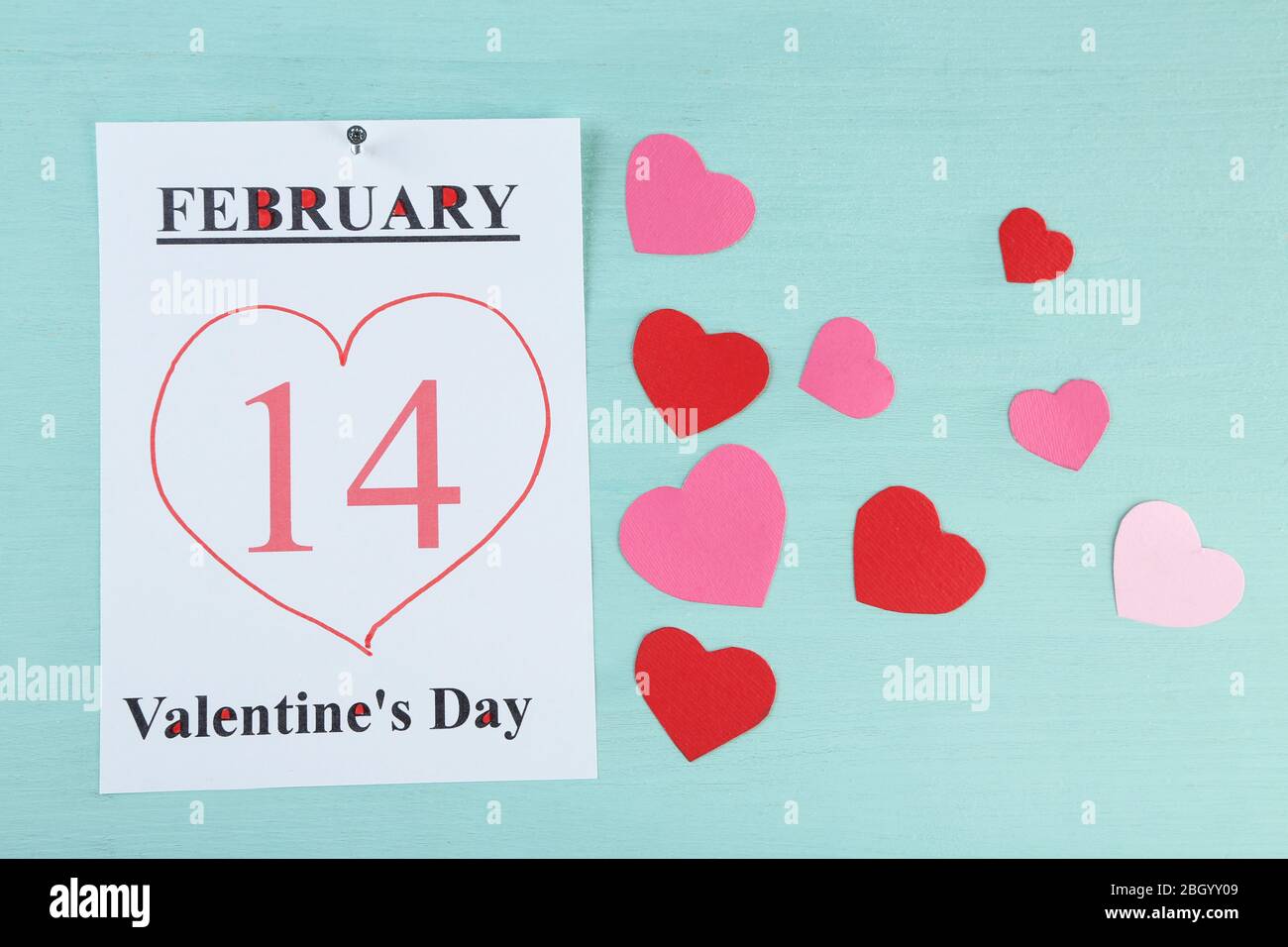 Valentines Day, February 14 on calendar on wooden background Stock ...
