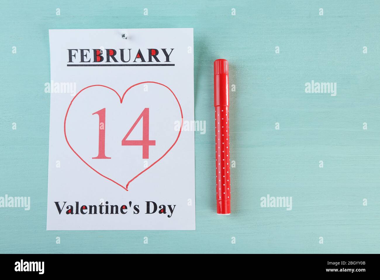 Valentines Day, February 14 on calendar on wooden background Stock ...