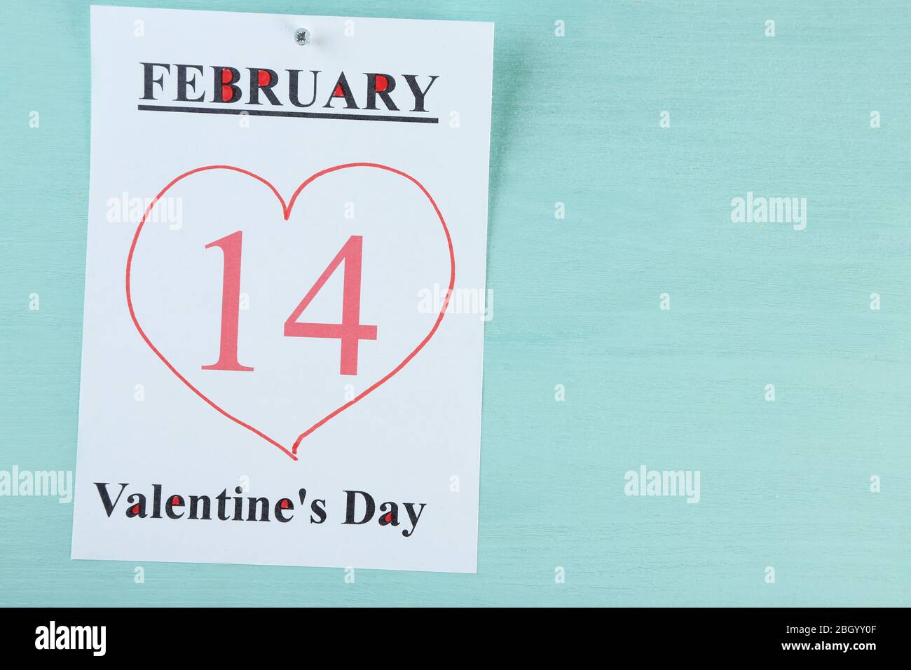 Valentines Day, February 14 on calendar on wooden background Stock ...