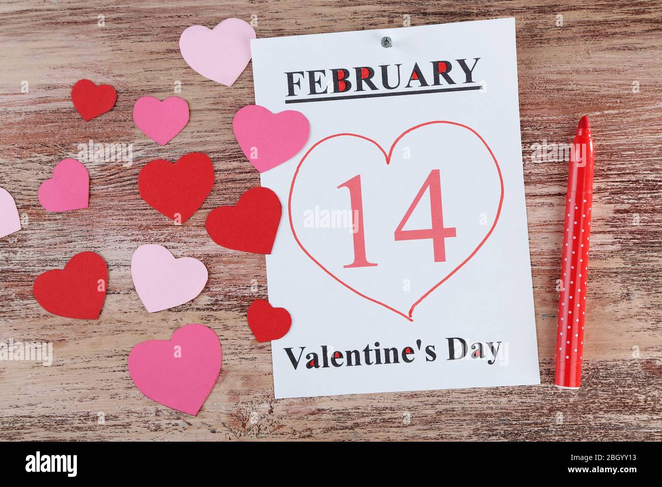 Valentines Day, February 14 on calendar on wooden background Stock ...