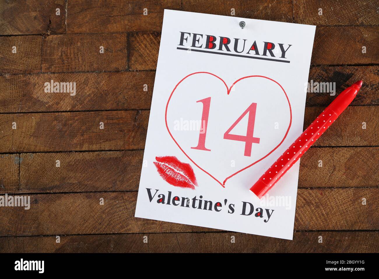 Valentines Day, February 14 on calendar on wooden background Stock ...