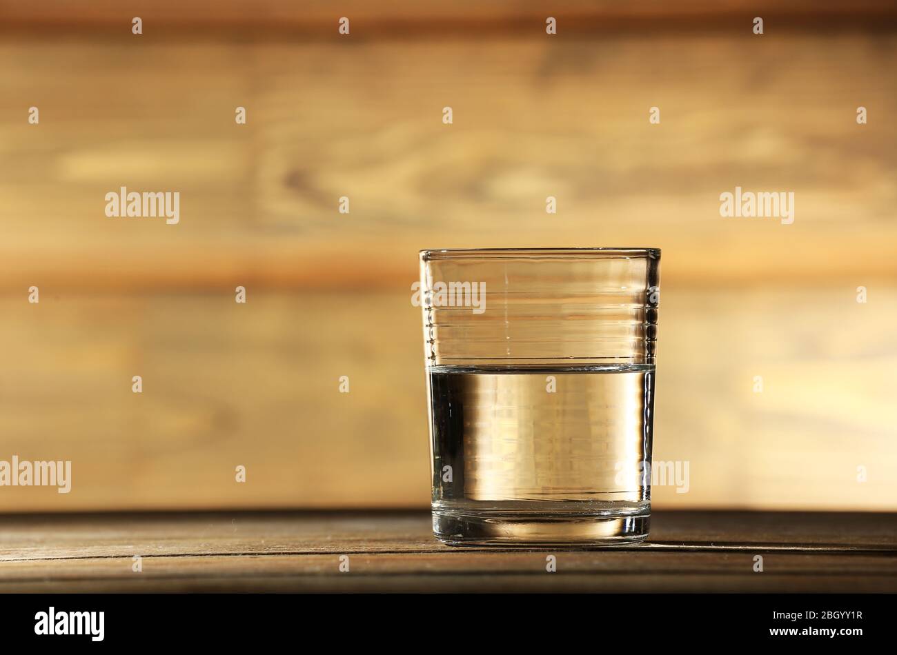Glass of clean mineral water on rustic wooden background Stock Photo ...
