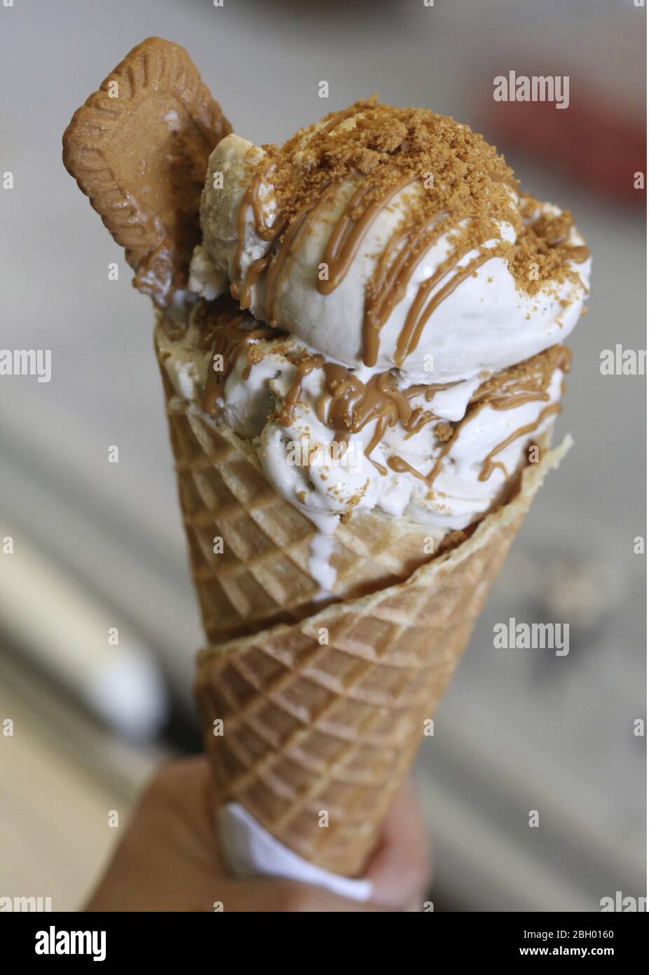 fresh one ice cream in a cone and one cookies Stock Photo - Alamy