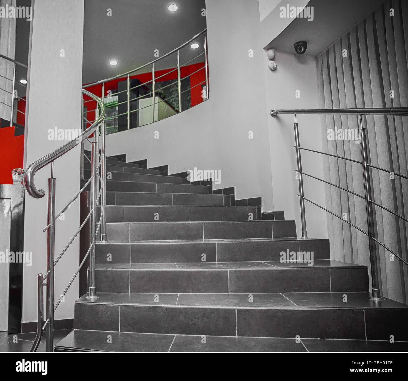 Security camera and motion detector installed on ceiling in gym Stock ...