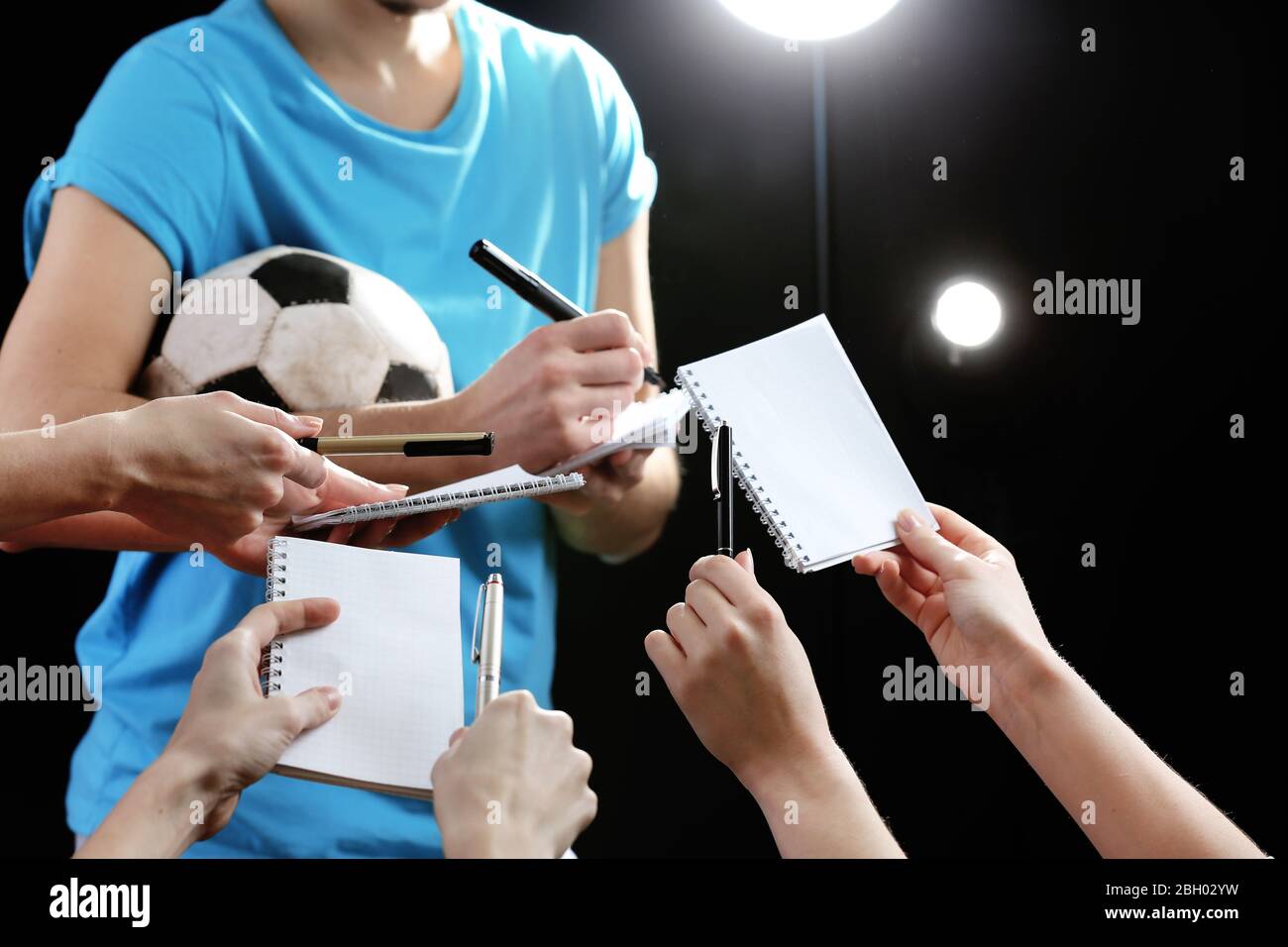 Autographs by football star on black and lights background Stock Photo ...