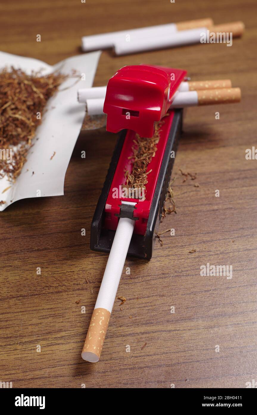 Cigarette rolling machine hi-res stock photography and images - Alamy