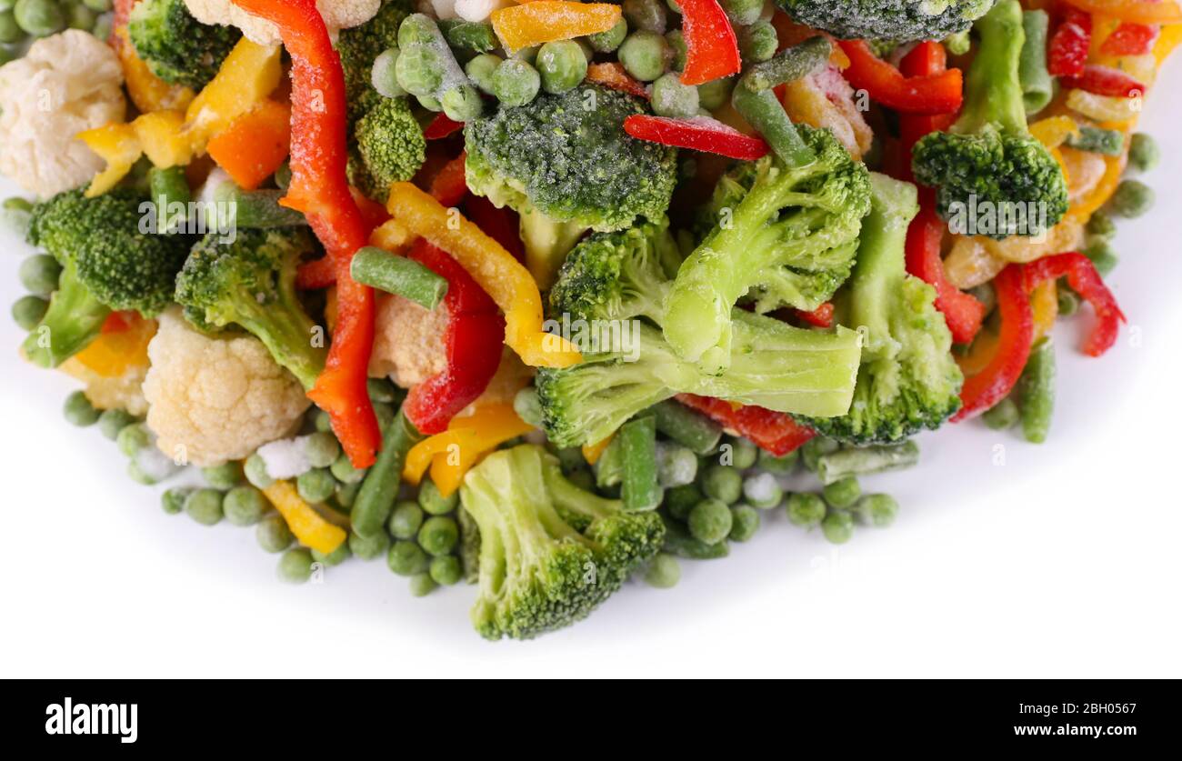 Frozen vegetables isolated on white Stock Photo - Alamy