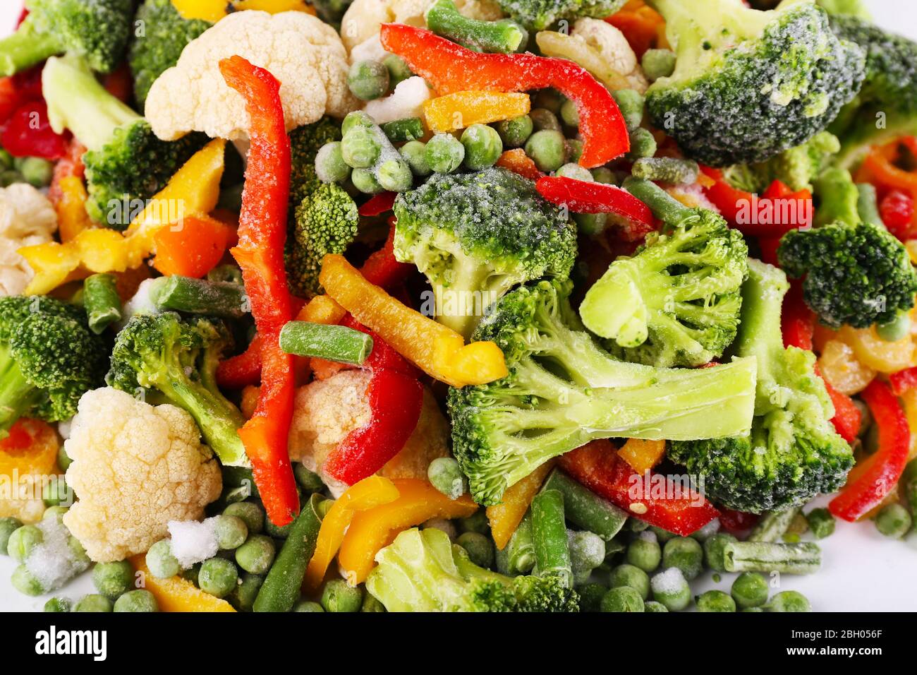 Frozen vegetables background Stock Photo - Alamy