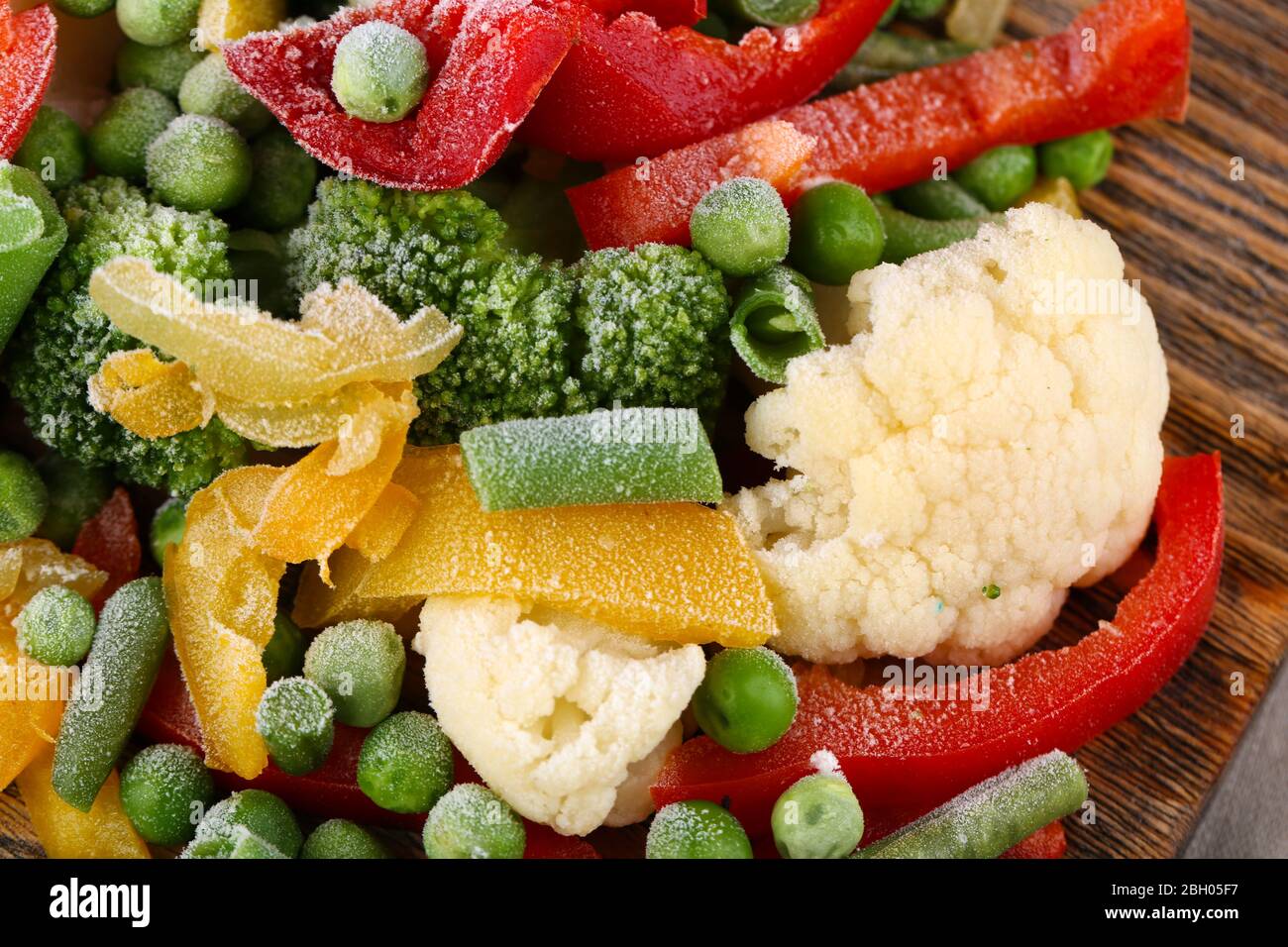 Frozen vegetables background Stock Photo - Alamy