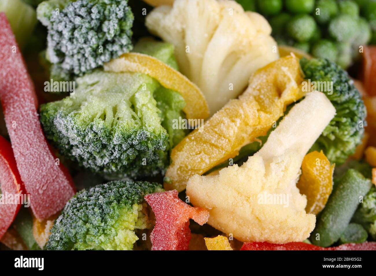 Frozen vegetables background Stock Photo - Alamy