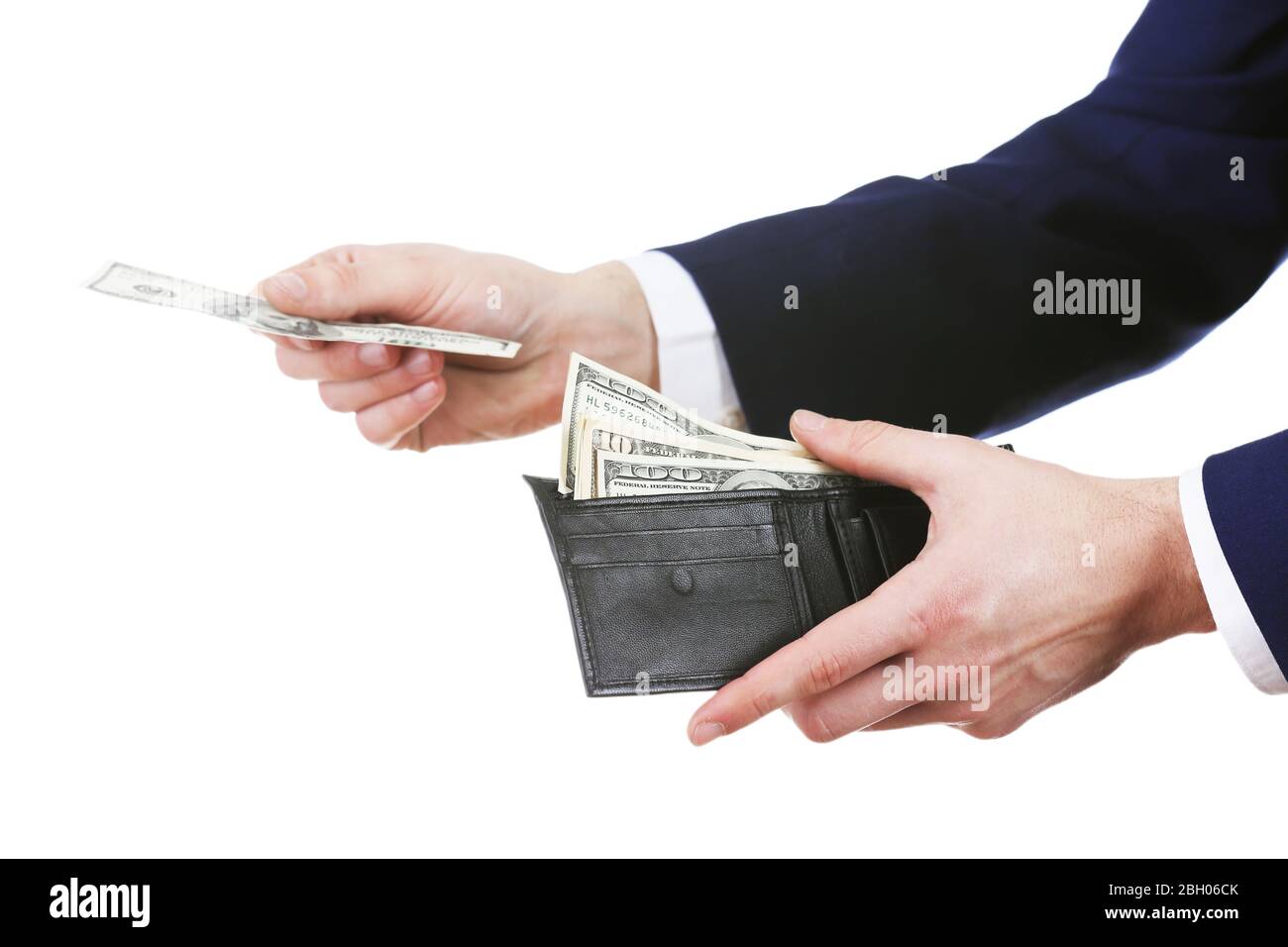 Leather wallet with money in male hands isolated on white background ...