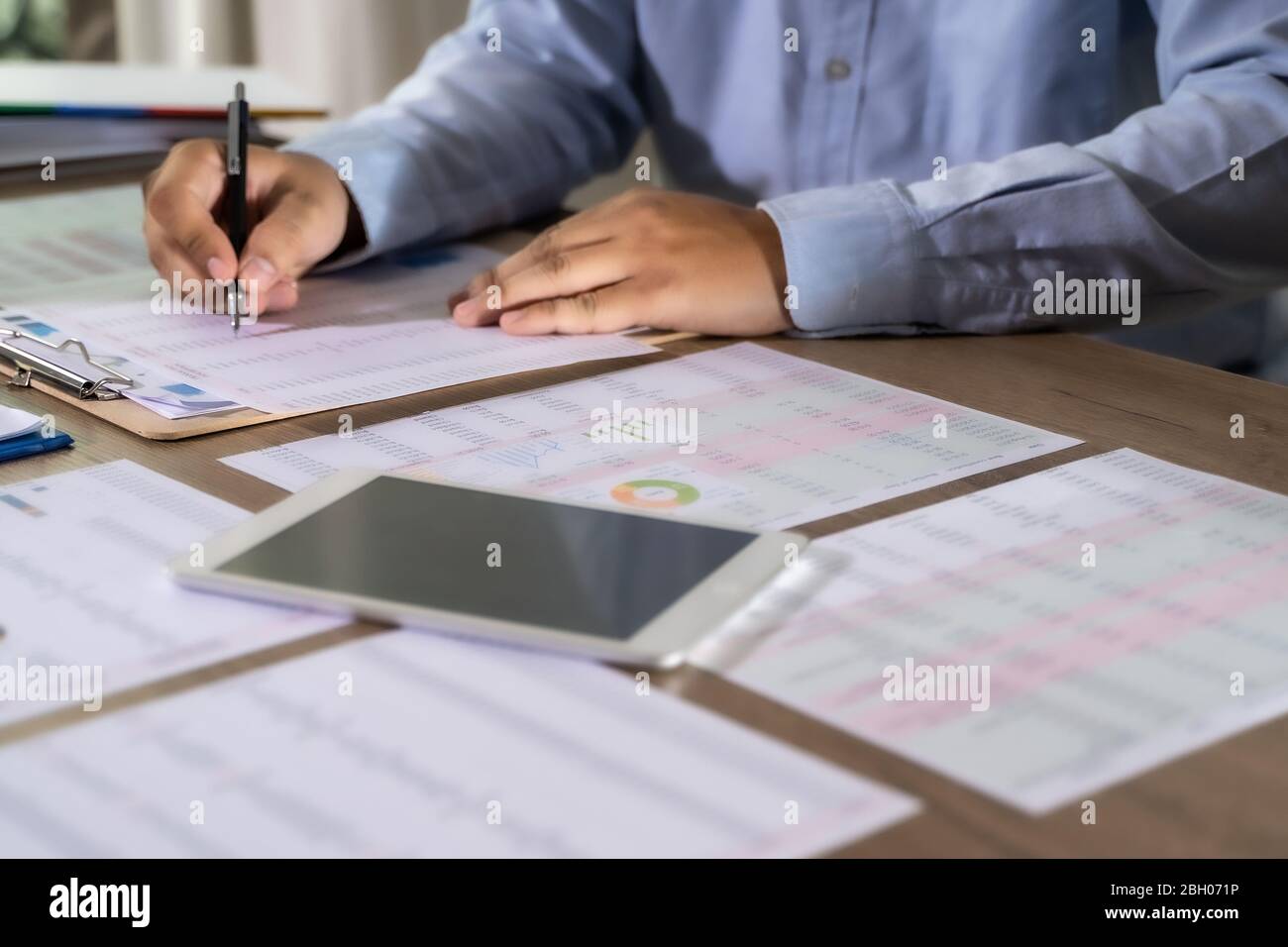 businessman working using a calculator finance accounting concept ...