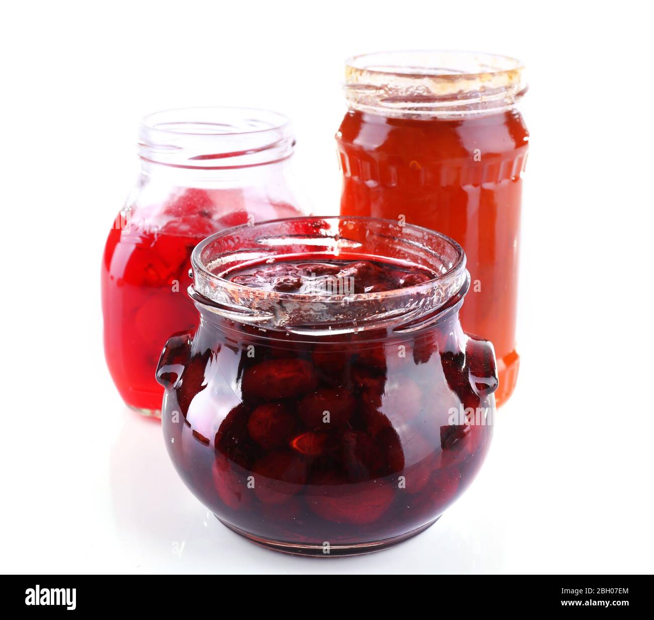 Homemade jars of fruits jam isolated on white background Stock Photo ...