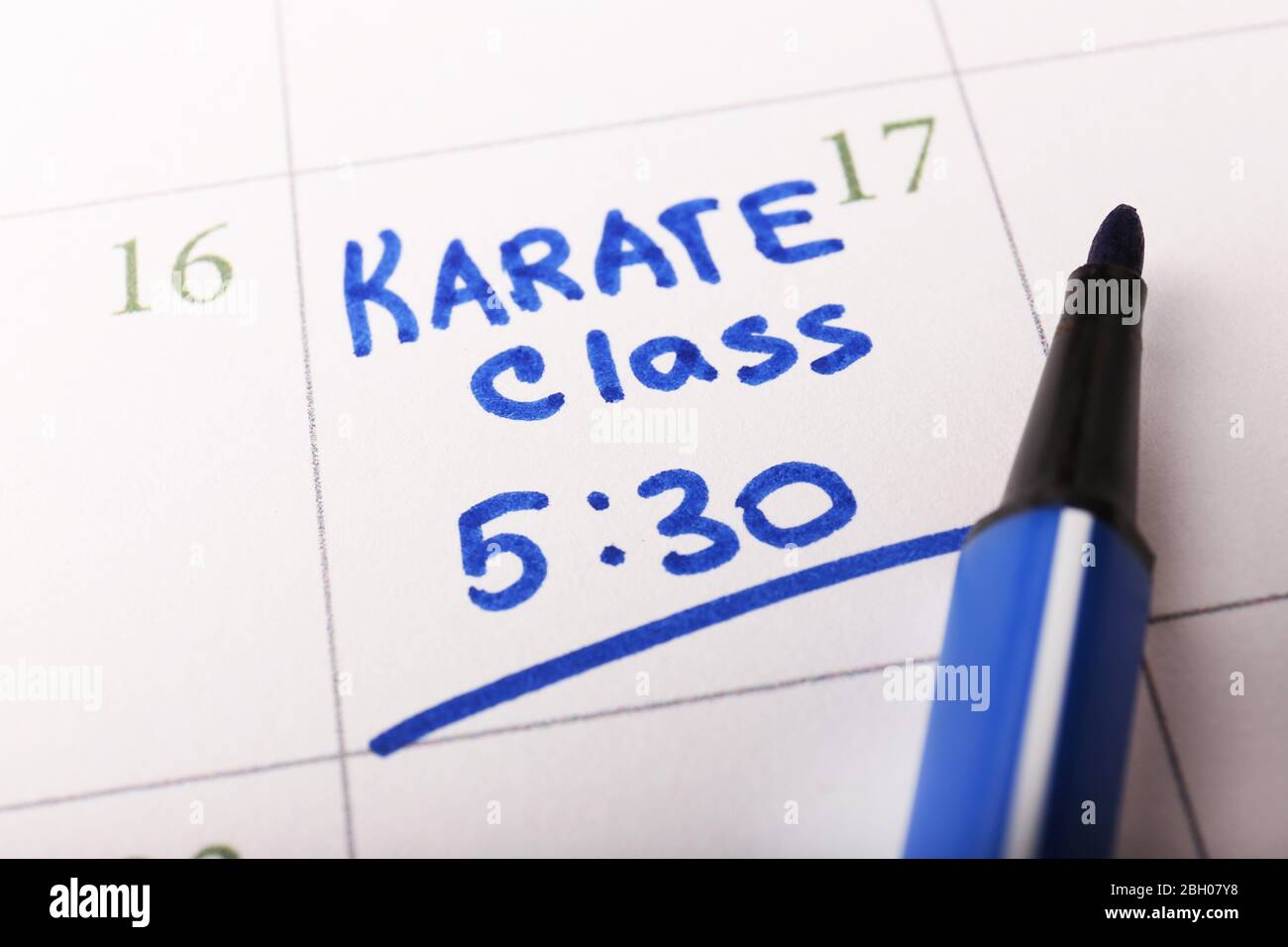 Written plan Karate Class on calendar page background Stock Photo - Alamy