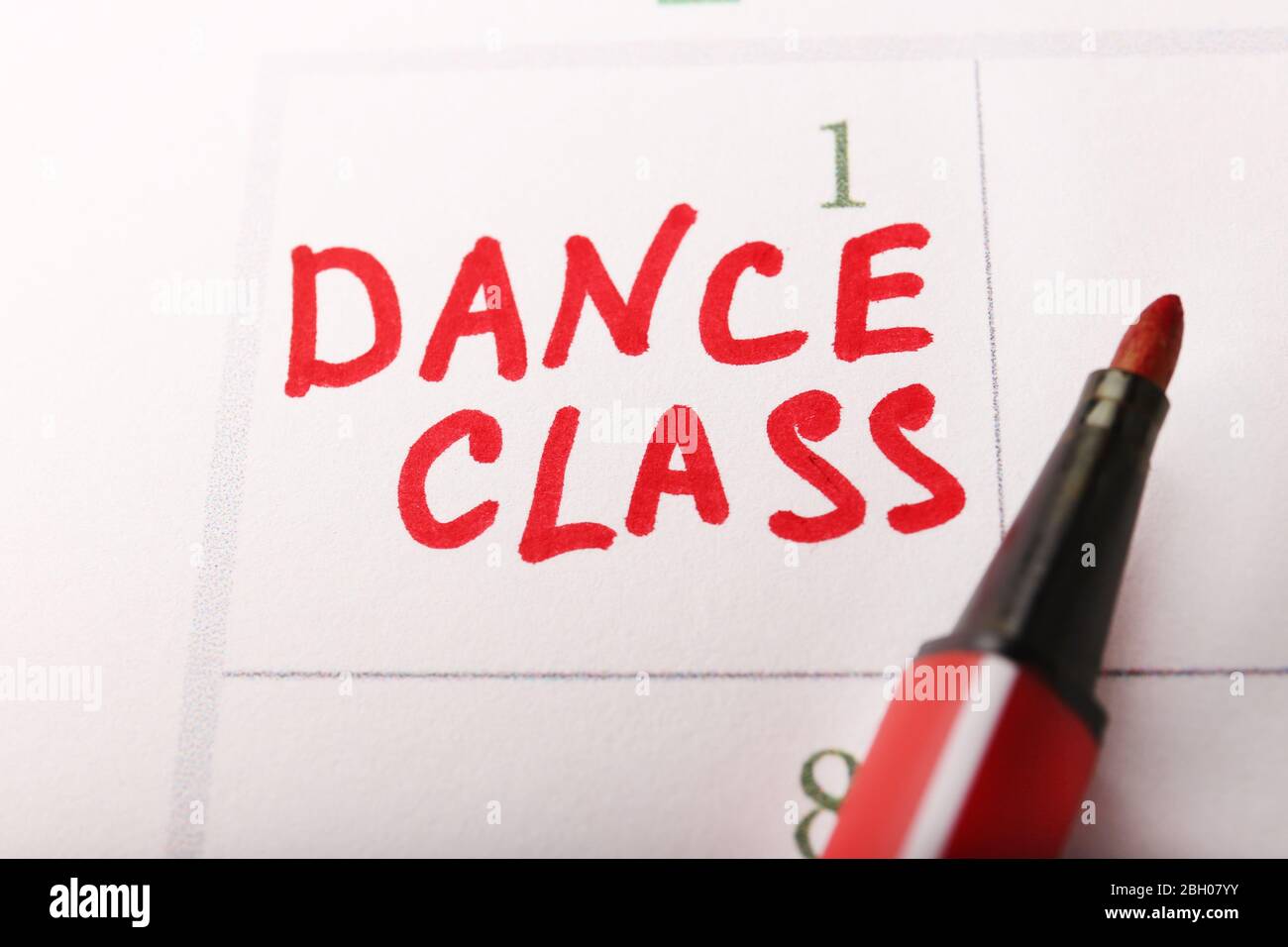 Written plan Dance Class on calendar page background Stock Photo - Alamy