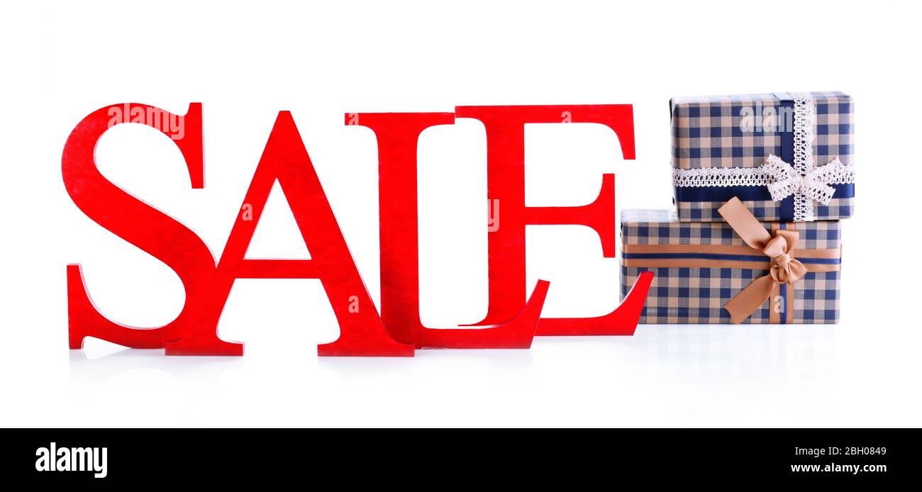 Sale with gifts isolated on white Stock Photo - Alamy