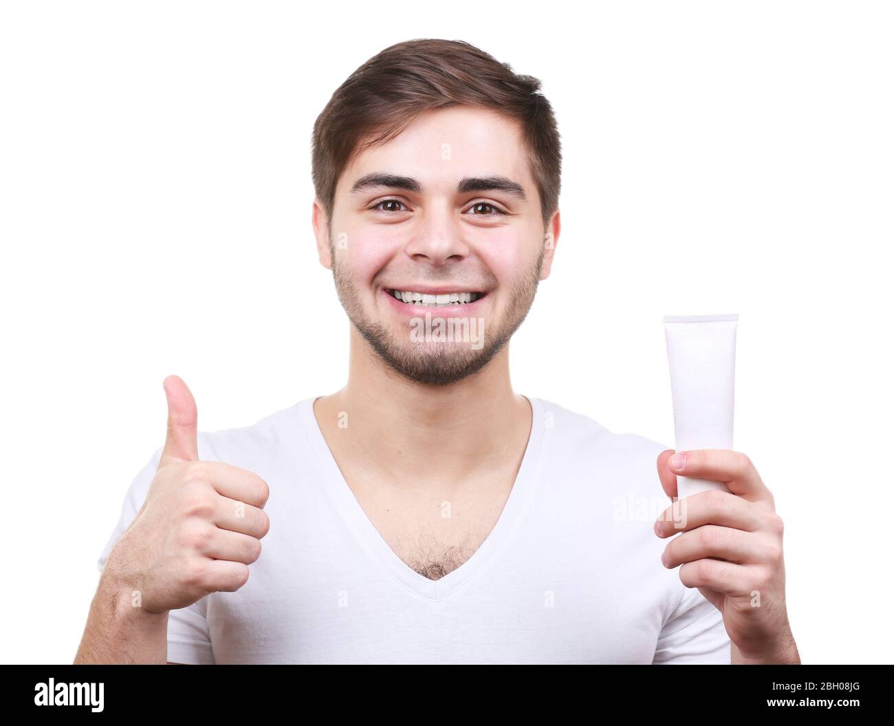 Smiling young man toothpaste hi-res stock photography and images - Alamy