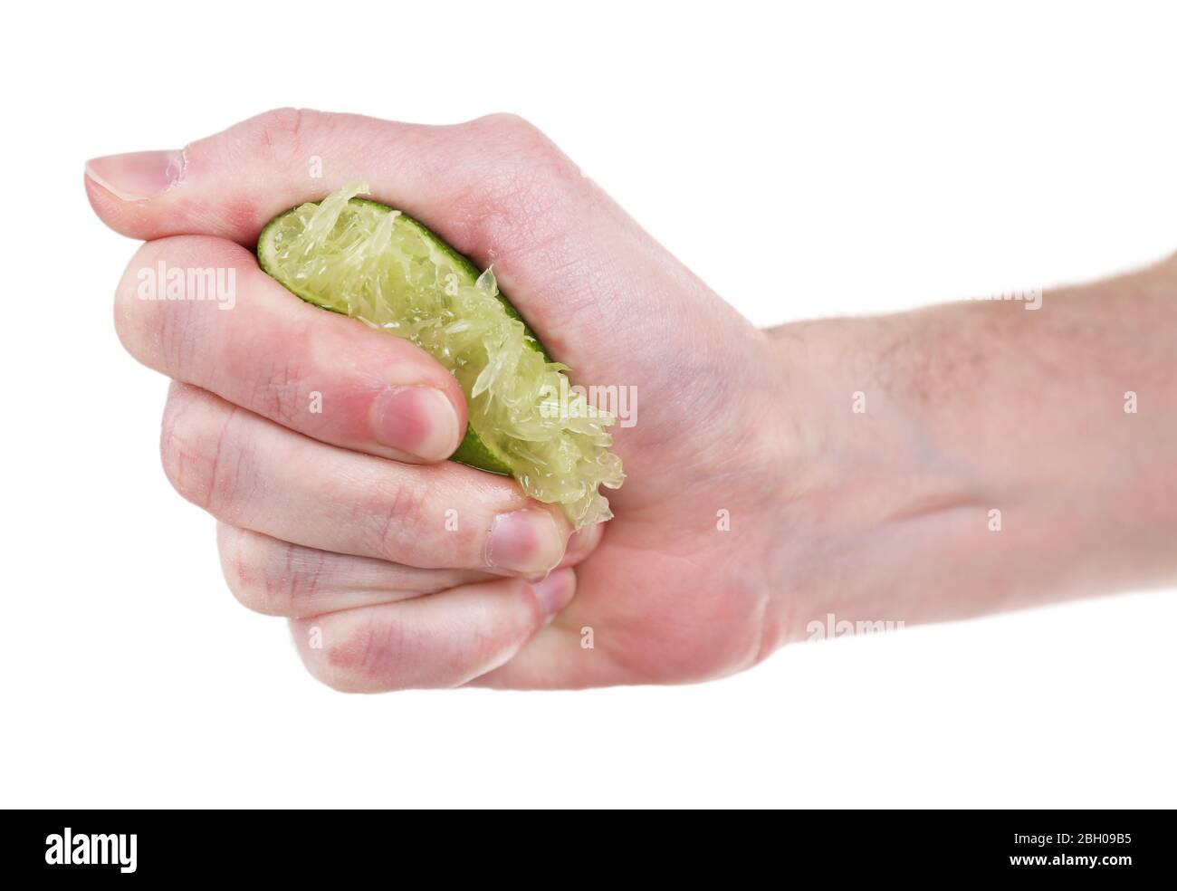 Female hand squeezing lime isolated on white Stock Photo - Alamy