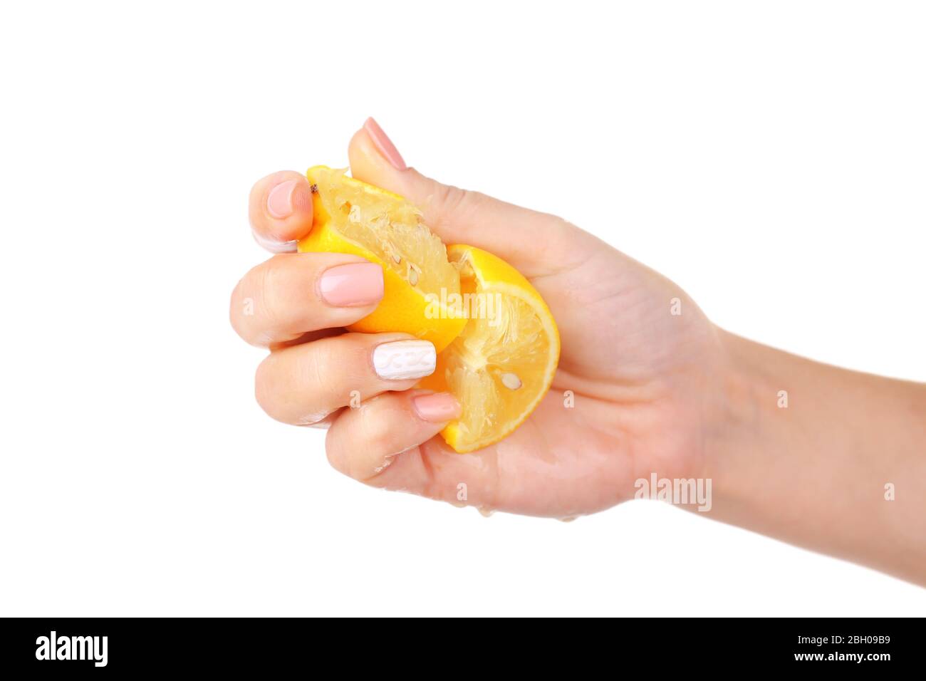 Female hand squeezing lemon isolated on white Stock Photo - Alamy