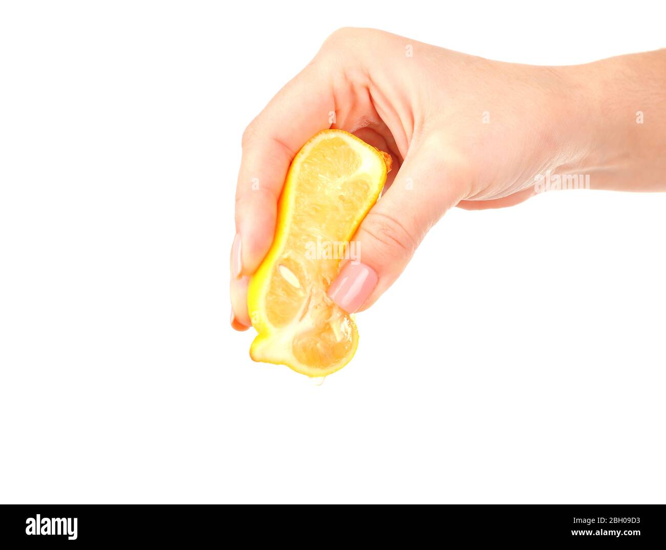 Female hand squeezing lemon isolated on white Stock Photo - Alamy