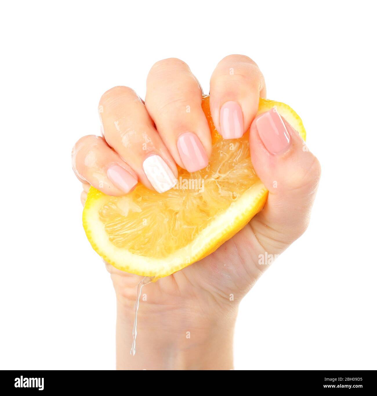 Female hand squeezing lemon isolated on white Stock Photo - Alamy