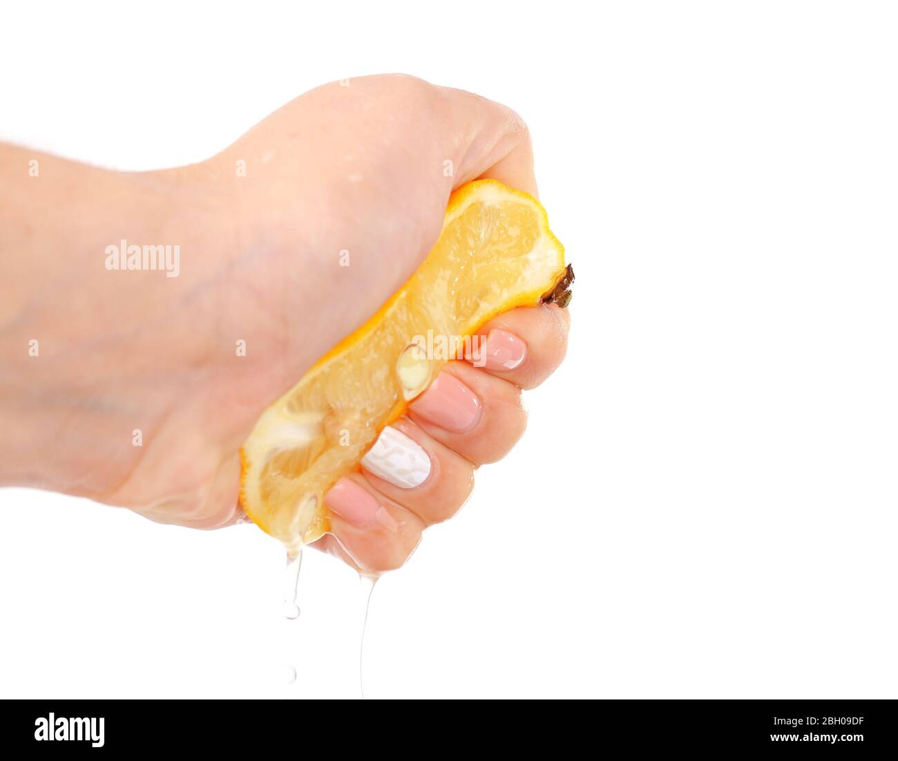 Female hand squeezing lemon isolated on white Stock Photo - Alamy