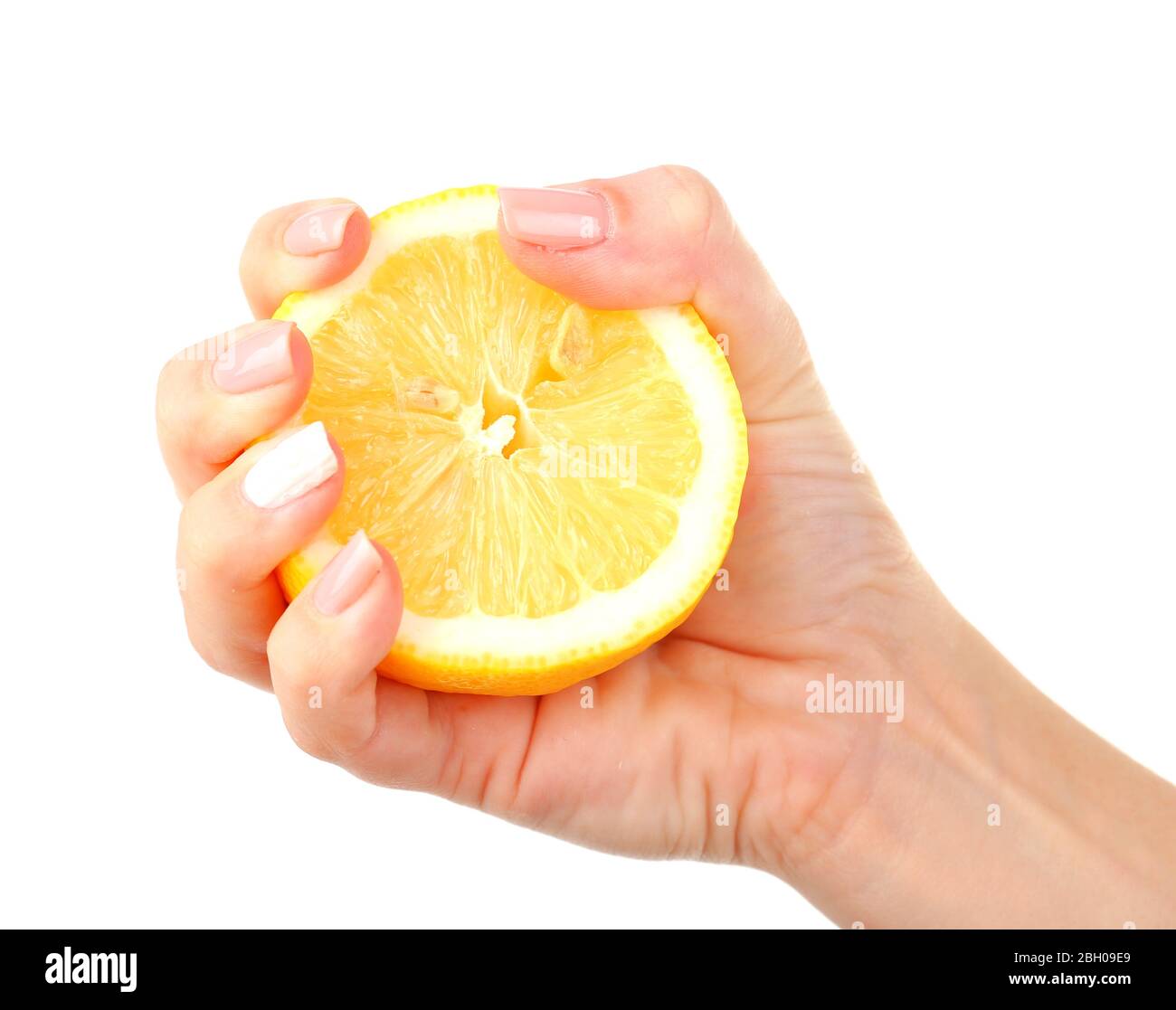 Female hand squeezing lemon isolated on white Stock Photo - Alamy