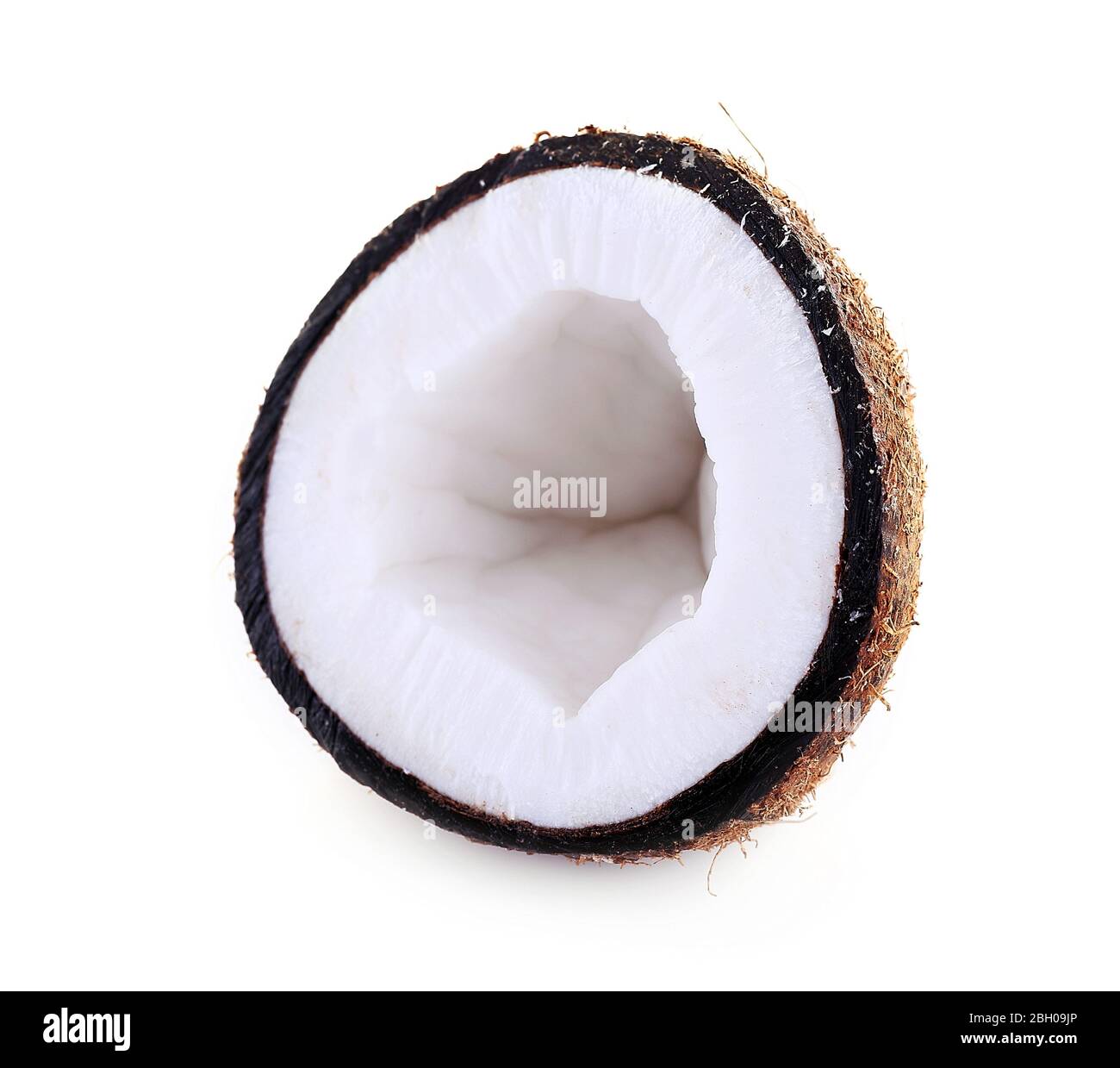 Coconut cut in half isolated on white background Stock Photo - Alamy