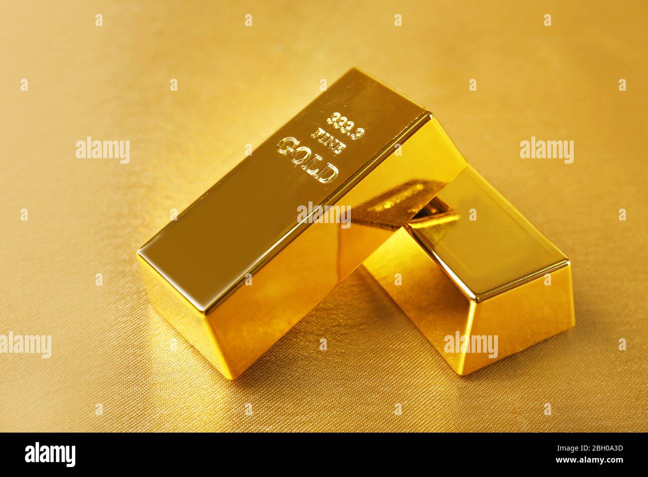 Gold bars on table close-up Stock Photo - Alamy