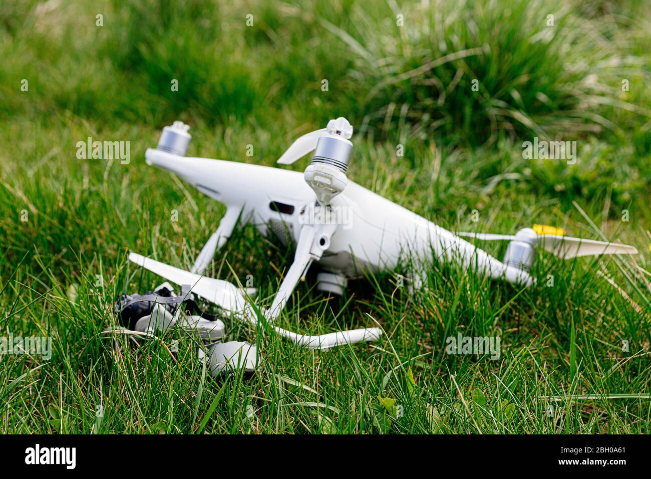 Broken unmanned aerial vehicle, broken drone after crash Stock Photo ...