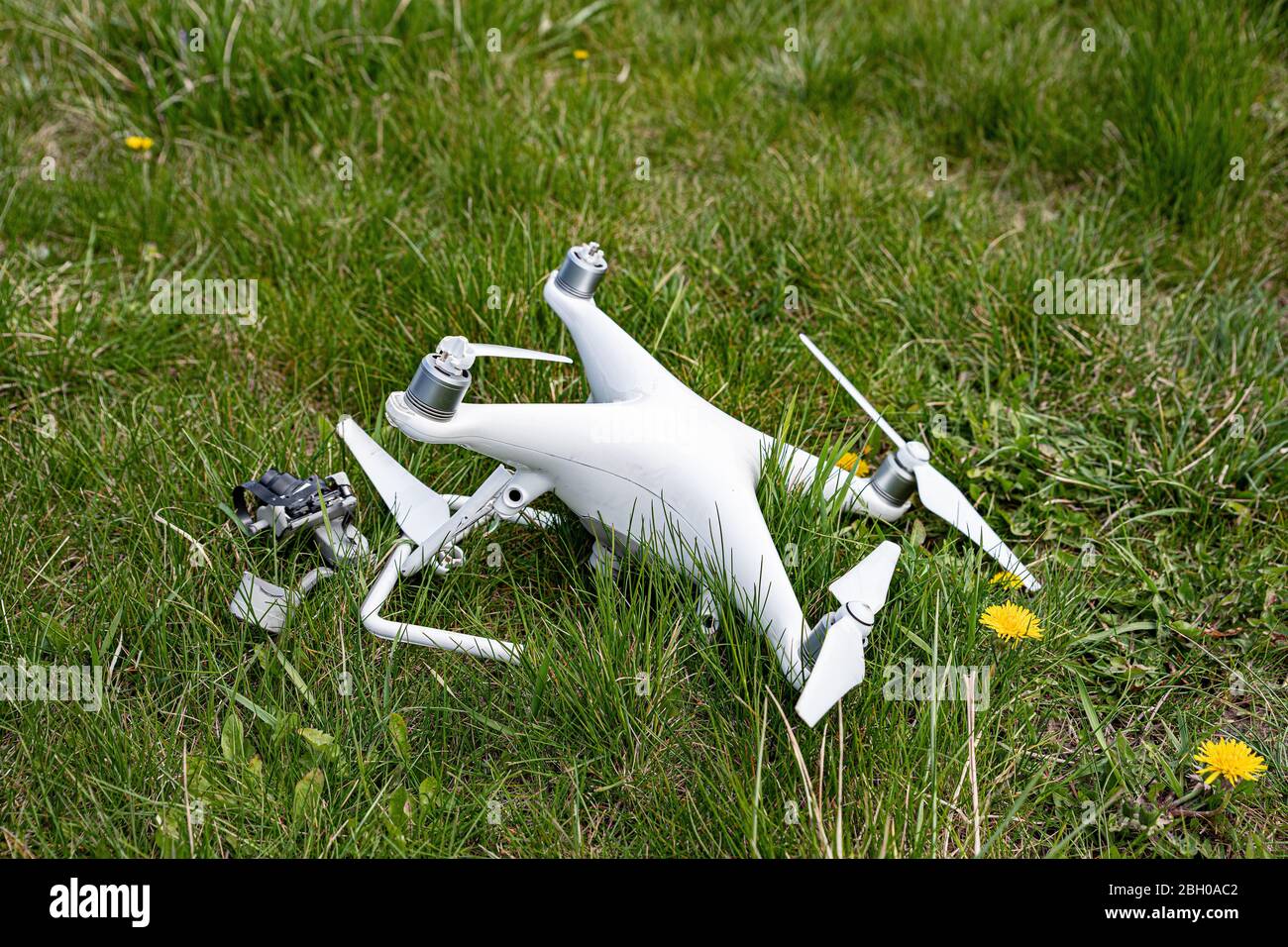Broken unmanned aerial vehicle, broken drone after crash Stock Photo ...