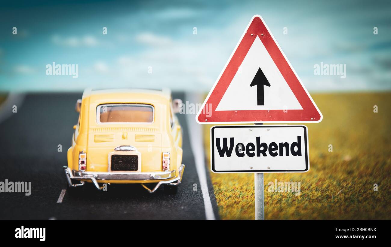 Street Sign the Direction Way to Weekend Stock Photo - Alamy