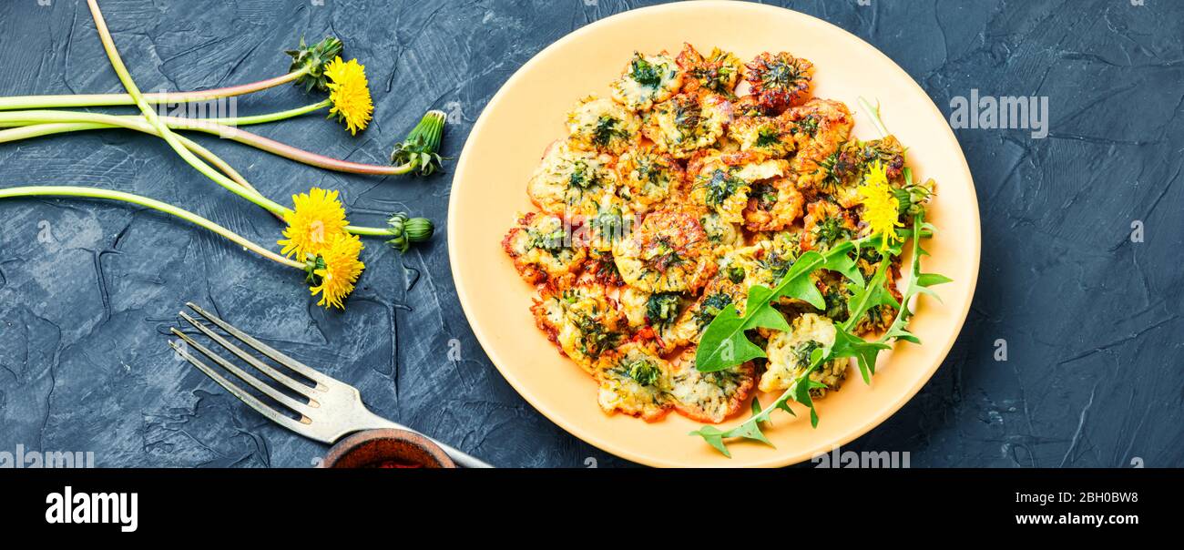 An unusual dish of fried dandelion flowers Stock Photo - Alamy