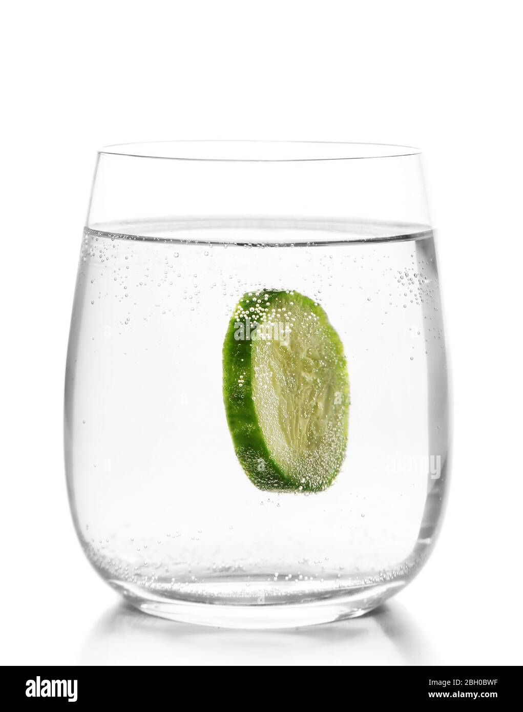 Glass with fresh cucumber, isolated on white Stock Photo - Alamy