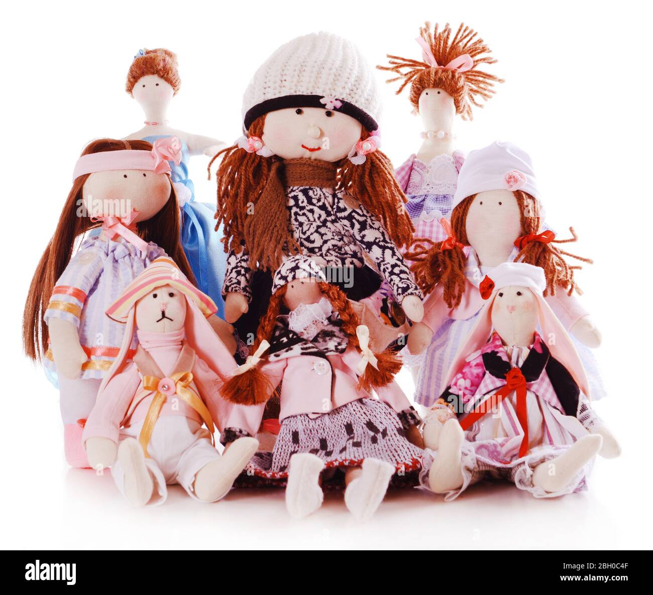 Handmade dolls isolated on white Stock Photo - Alamy