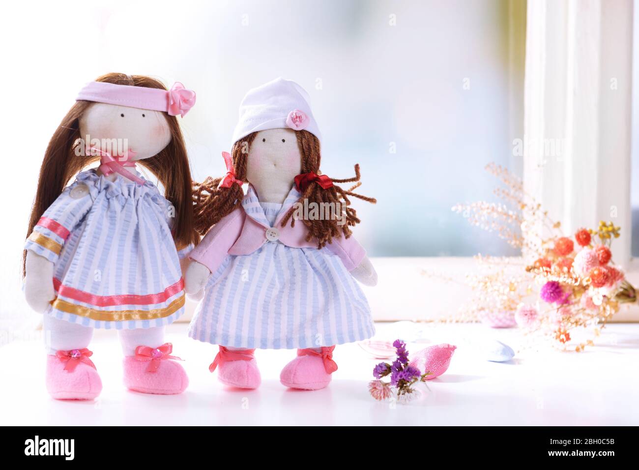 Handmade doll near window close-up Stock Photo - Alamy