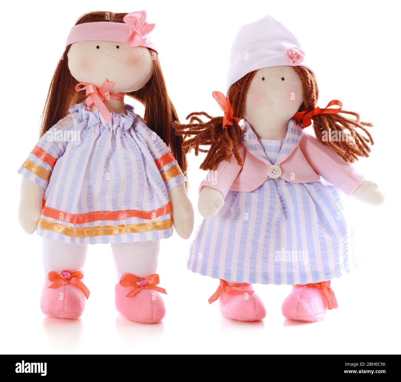 Handmade dolls isolated on white Stock Photo - Alamy