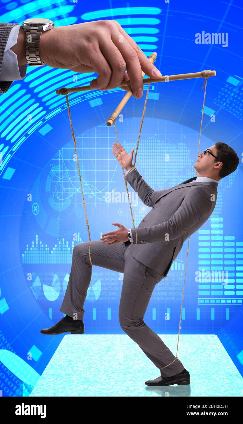 The businessman puppet being manipulated by boss Stock Photo - Alamy