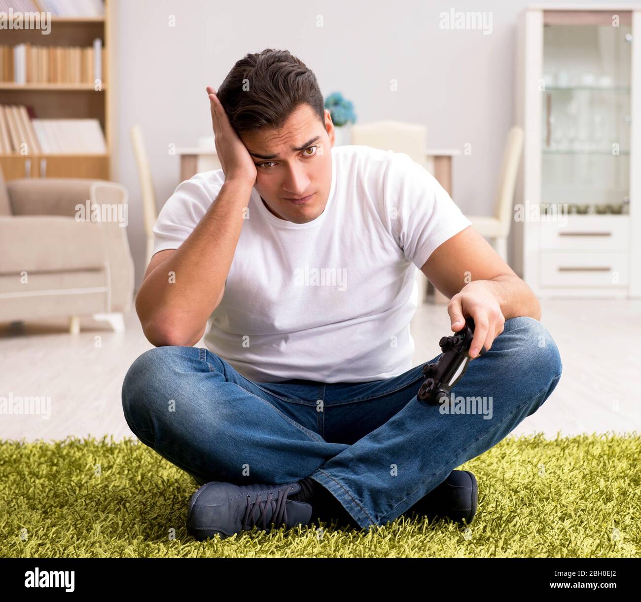 The man addicted to computer games Stock Photo - Alamy