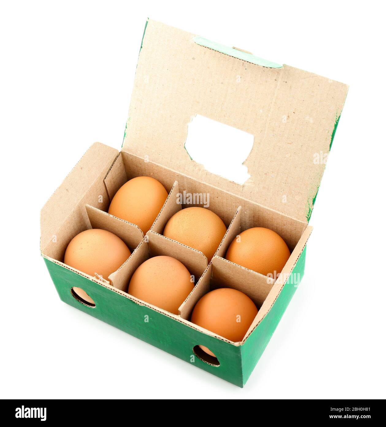 Egg box with six brown eggs isolated on white Stock Photo - Alamy
