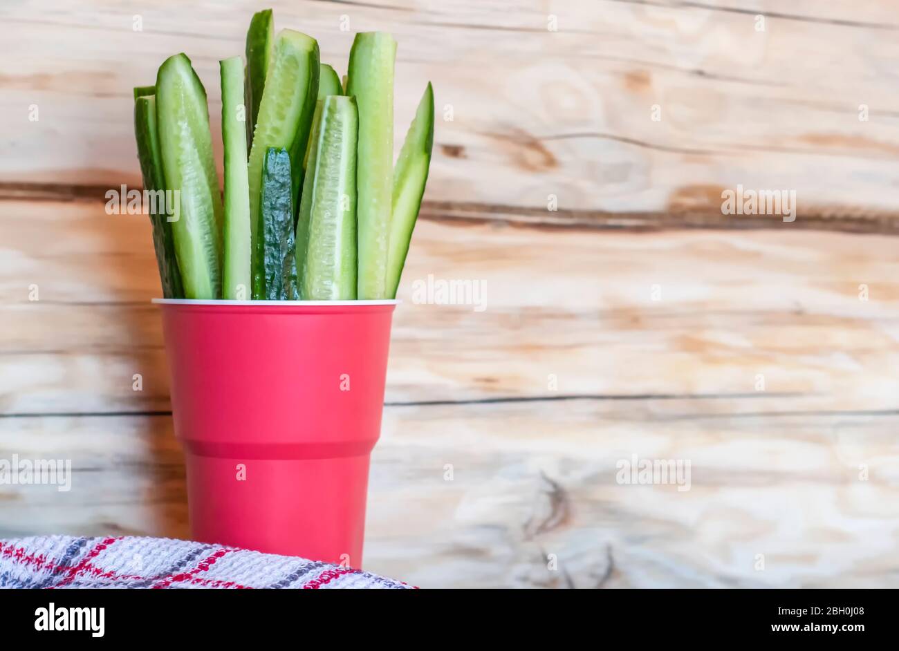 Chopped cucumber in a glass. Healthy food. Vegetable snack Stock Photo ...