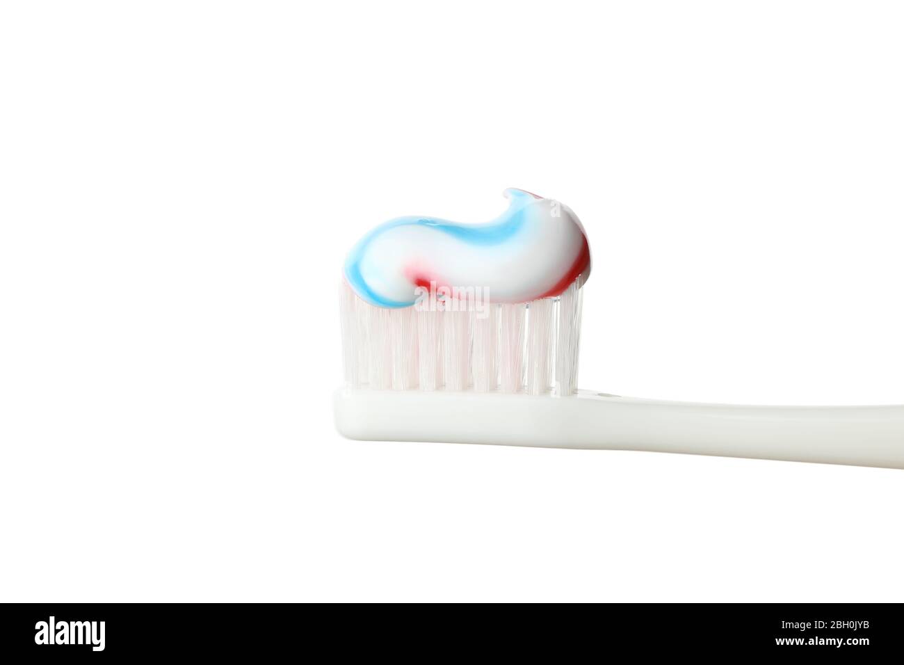Toothbrush with toothpaste isolated on white background Stock Photo - Alamy