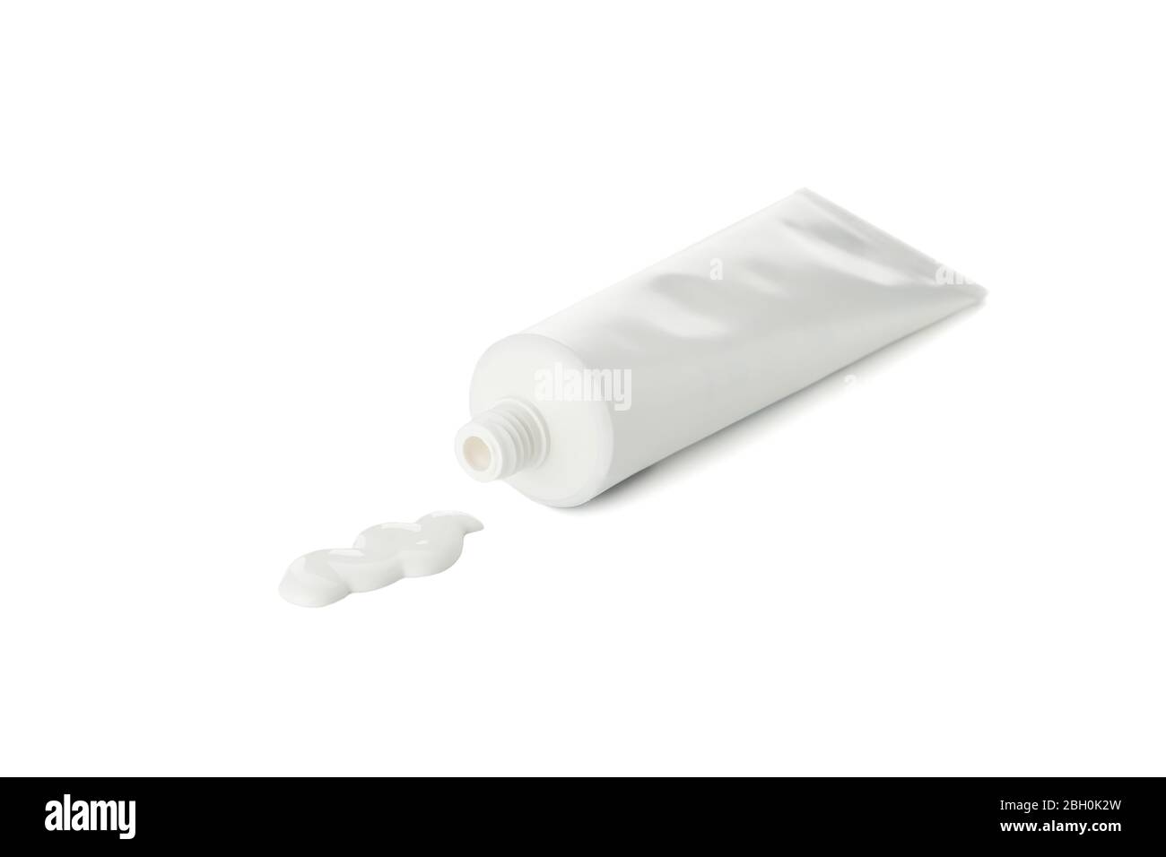 Blank tube with toothpaste isolated on white background Stock Photo - Alamy