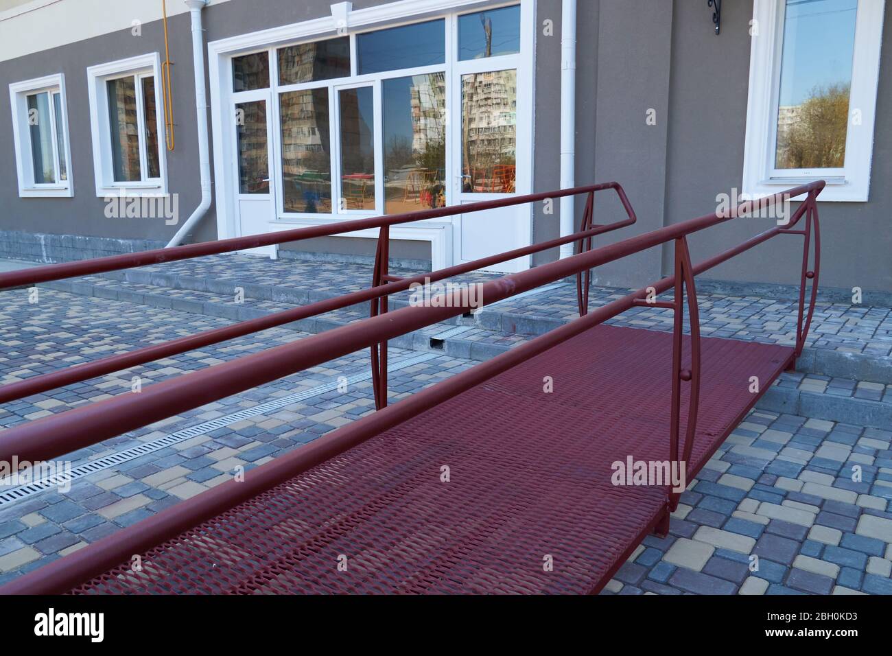 Wheelchair access ramp for entrance of residential multistory building ...