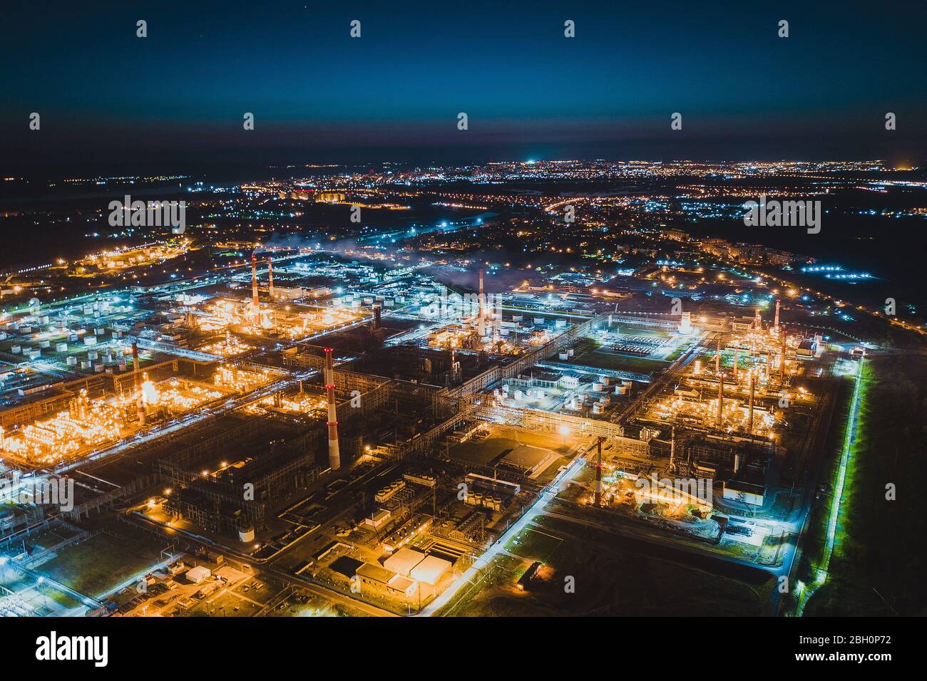 Oil refinery night Stock Photo - Alamy